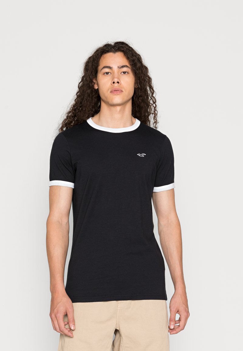 Hollister Co. STORE MUSCLE FIT RINGER CREW - T-shirt - bas - black ...
