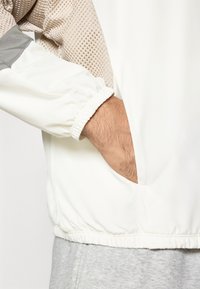 Nike Performance ICON - Training jacket - sail/cream/dark stucco/off ...