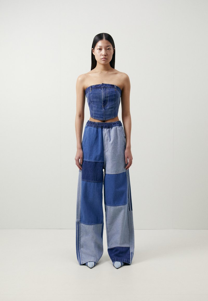 adidas Originals KSENIA SCHNAIDER PATCHWORK - Relaxed fit jeans - light ...