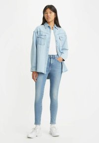 Levi's® HIGH RISE - Jeans Skinny Fit - blue wave mid med indigo/blau ...