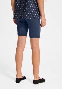 Hummel Kurze Sporthose - black iris black iris/blue denim - Zalando.at