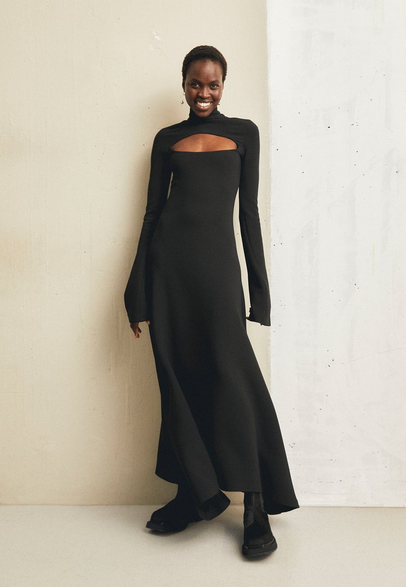 A W A K E Mode Flared Sleeve Dress With Chest Cut Out Detail Maxi