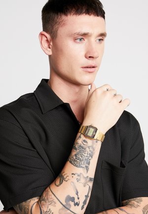 Casio ROUND UNISEX - Digital watch - gold-coloured - Zalando.co.uk