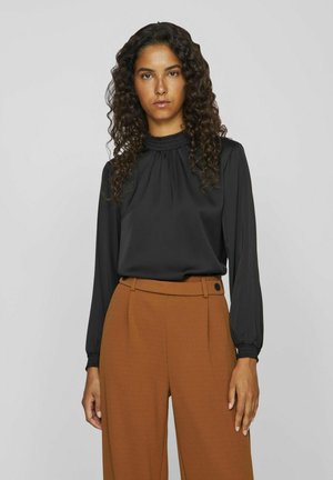 Schwarze Blusen für Damen - dein Statement Piece | bei ZALANDO