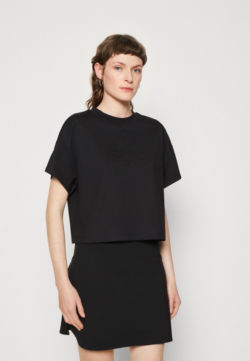Calvin Klein Jeans EMBOSSED MONOLOGO TEE - Camiseta básica - black/negro - Zalando.es