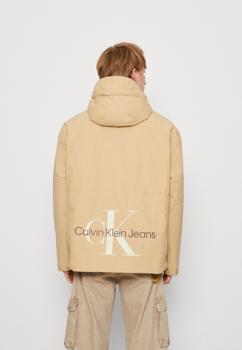 Calvin Klein Jeans ARCHIVAL MONOLOGO - Light jacket - travertine/beige ...