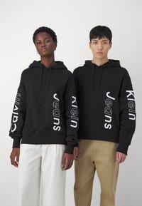 Calvin Klein Jeans BLOCKING GRAPHIC HOODIE UNISEX - Kapuzenpullover ...