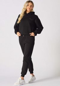 HERMAN&CO CORE MOTIVE OVERHEAD - Hoodie - black - Zalando.co.uk