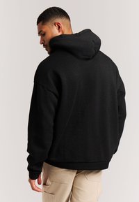 Protest HEELEY - Sweat à capuche - true black/noir - ZALANDO