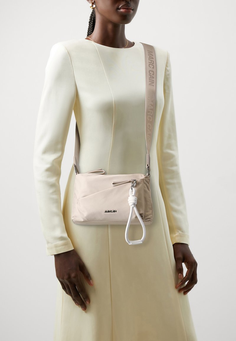 Marc Cain Across body bag - soft moon rock/beige - Zalando