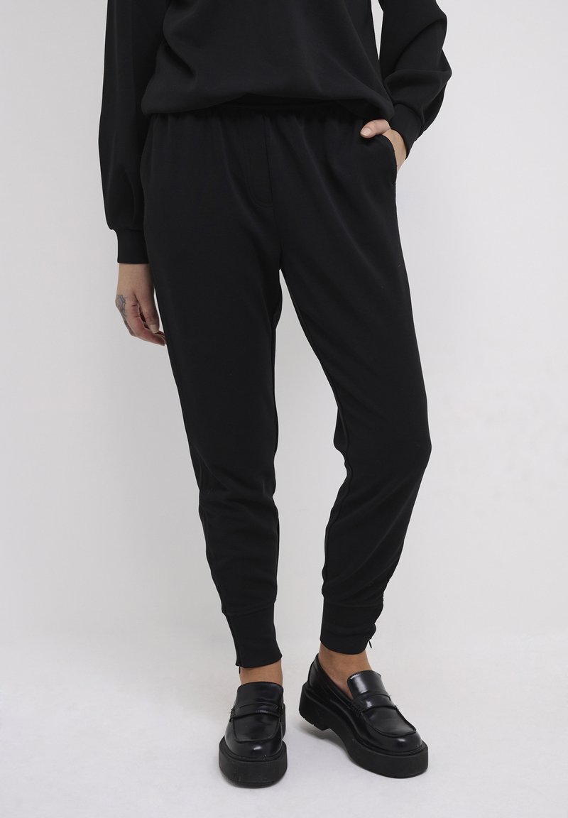 My Essential Wardrobe Tracksuit bottoms - black - Zalando.ie