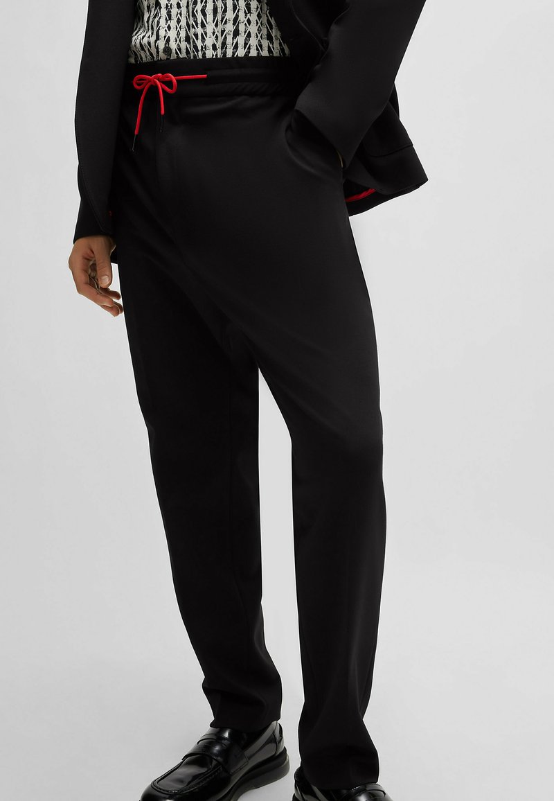 HUGO HOWARD - Trousers - black one/black - Zalando.ie