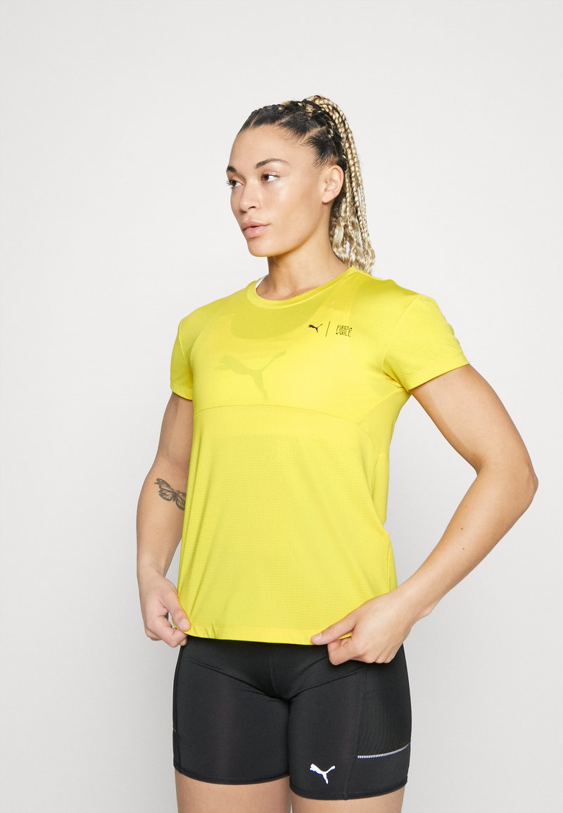 Puma FIRST MILE TEE - Camiseta deportiva - fresh pear/amarillo - Zalando.es