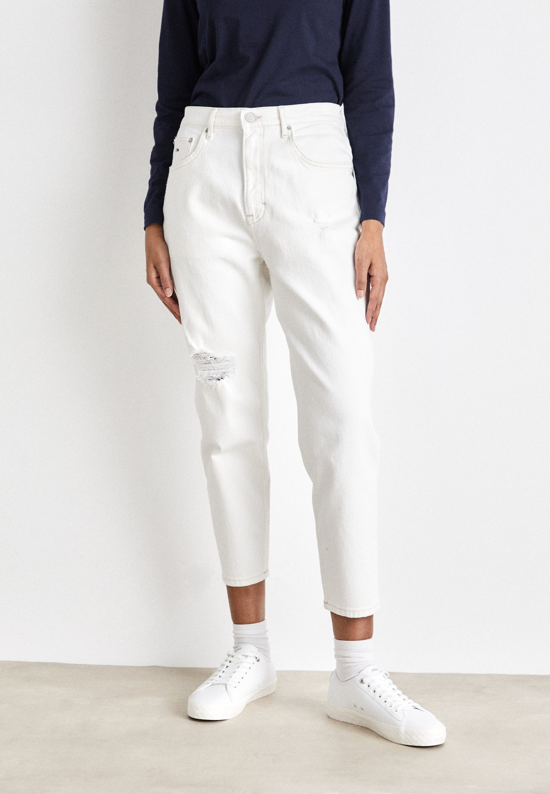 White ripped mom jeans store