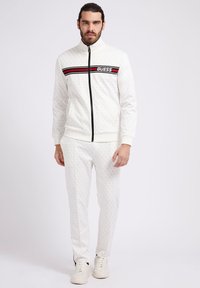 Guess ALLOVER LOGO - Sweater met rits - weiß/wit - Zalando.nl