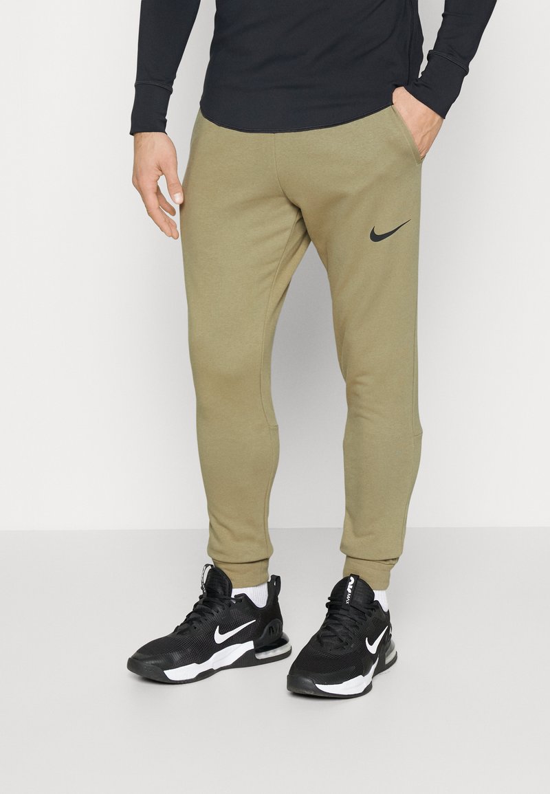 Nike Performance PANT TAPER - Tepláky - neutral olive/black/zelená ...