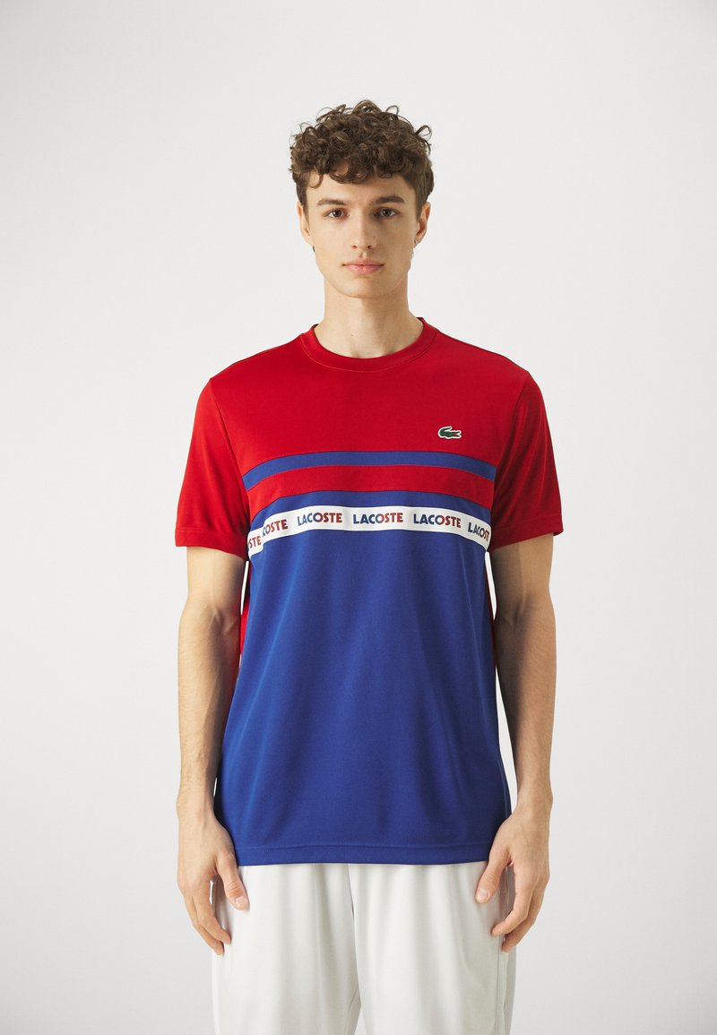 Lacoste Sport T-SHIRT TC - Sports T-shirt - captain/ora/blue - Zalando.ie
