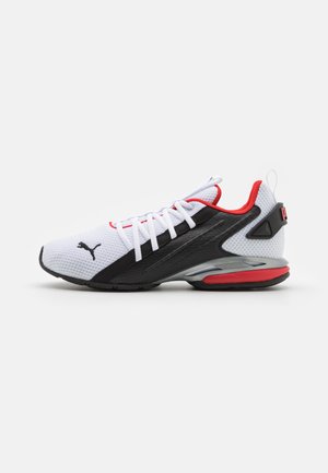 Puma SOFTRIDE ENZO EVOLVE - Zapatillas de running neutras - high risk ...