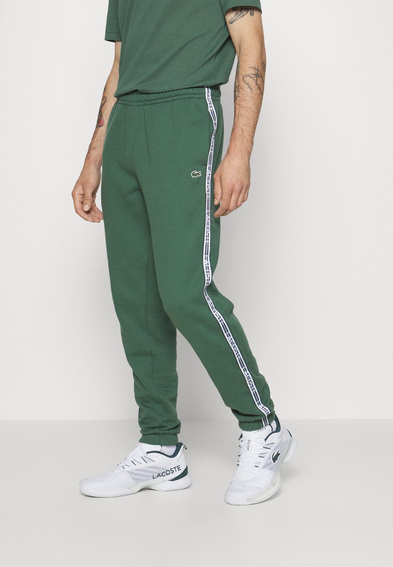 Lacoste Sport PANT TAPERED - Tracksuit bottoms - sequoia/mottled green ...