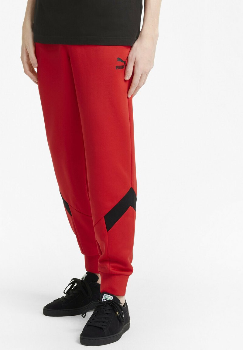 Puma ICONIC MCS - Tracksuit bottoms - high risk red/red - Zalando.de