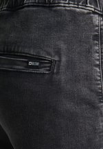 Big Star ROBBIN - Jeans Tapered Fit - schwarz - Zalando.at