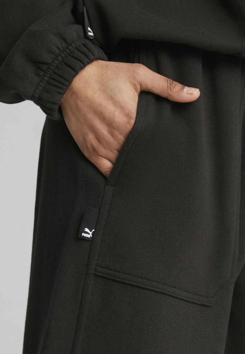 Puma DOWNTOWN - Tracksuit bottoms - black - Zalando.ie