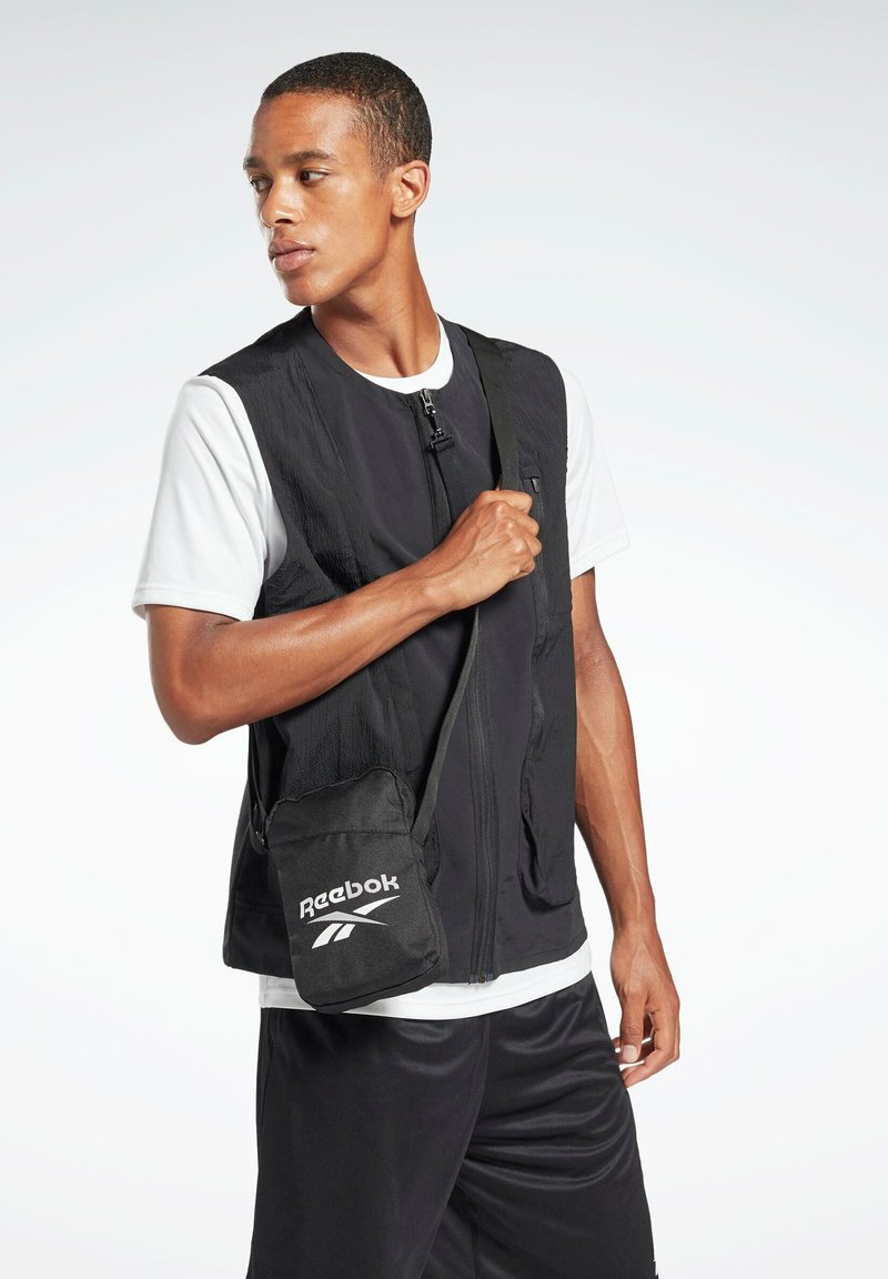 Reebok ESSENTIALS CITY - Across body bag - black - Zalando.ie