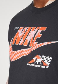 Nike Sportswear TEE SOLE RALLY - T-Shirt print - black/schwarz - Zalando.at