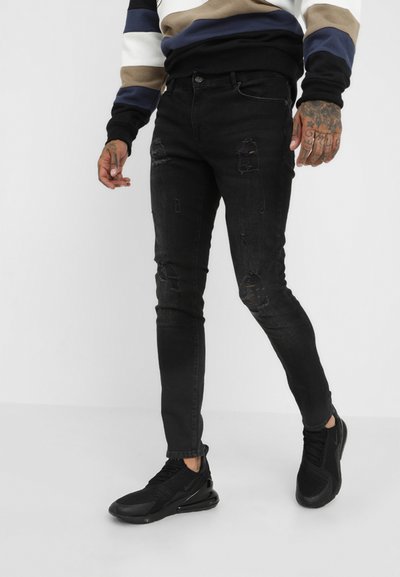 Urban Classics HEAVY DESTROYED SLIM FIT JEANS - Slim fit -farkut - blue ...