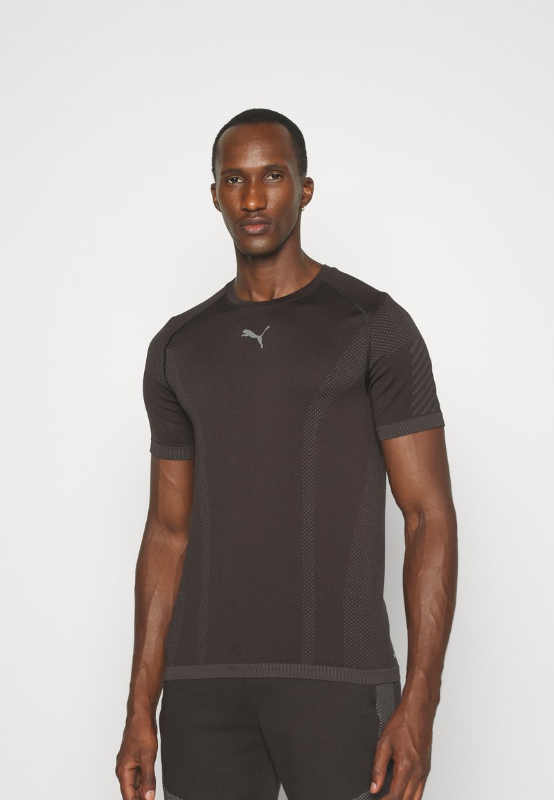 Puma TRAIN SEAMLESS - Basic T-shirt - black - Zalando.co.uk