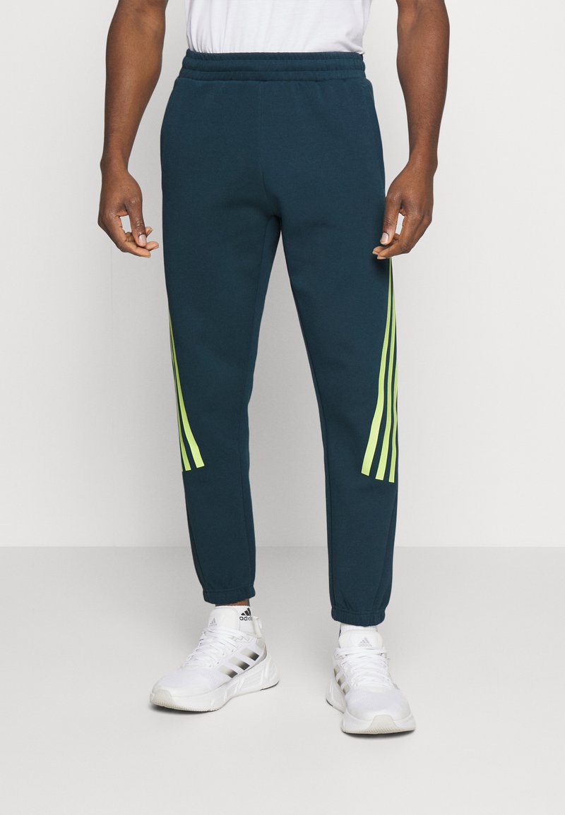 adidas Sportswear M FI S PT - Jogginghose - arctic night/grün - Zalando.de
