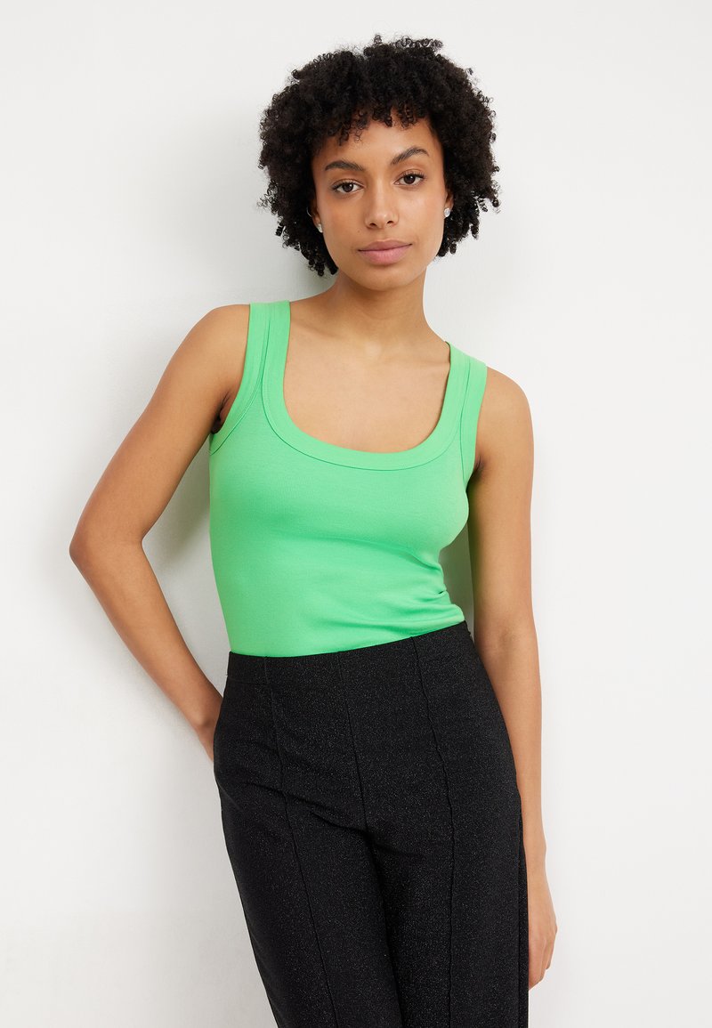 Marc Cain Top - new neon green/verde neón - Zalando.es