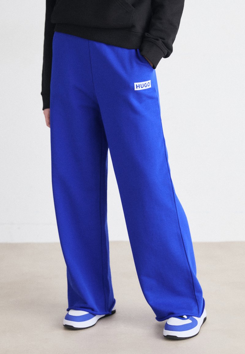 HUGO Tracksuit bottoms - open blue/blue - Zalando