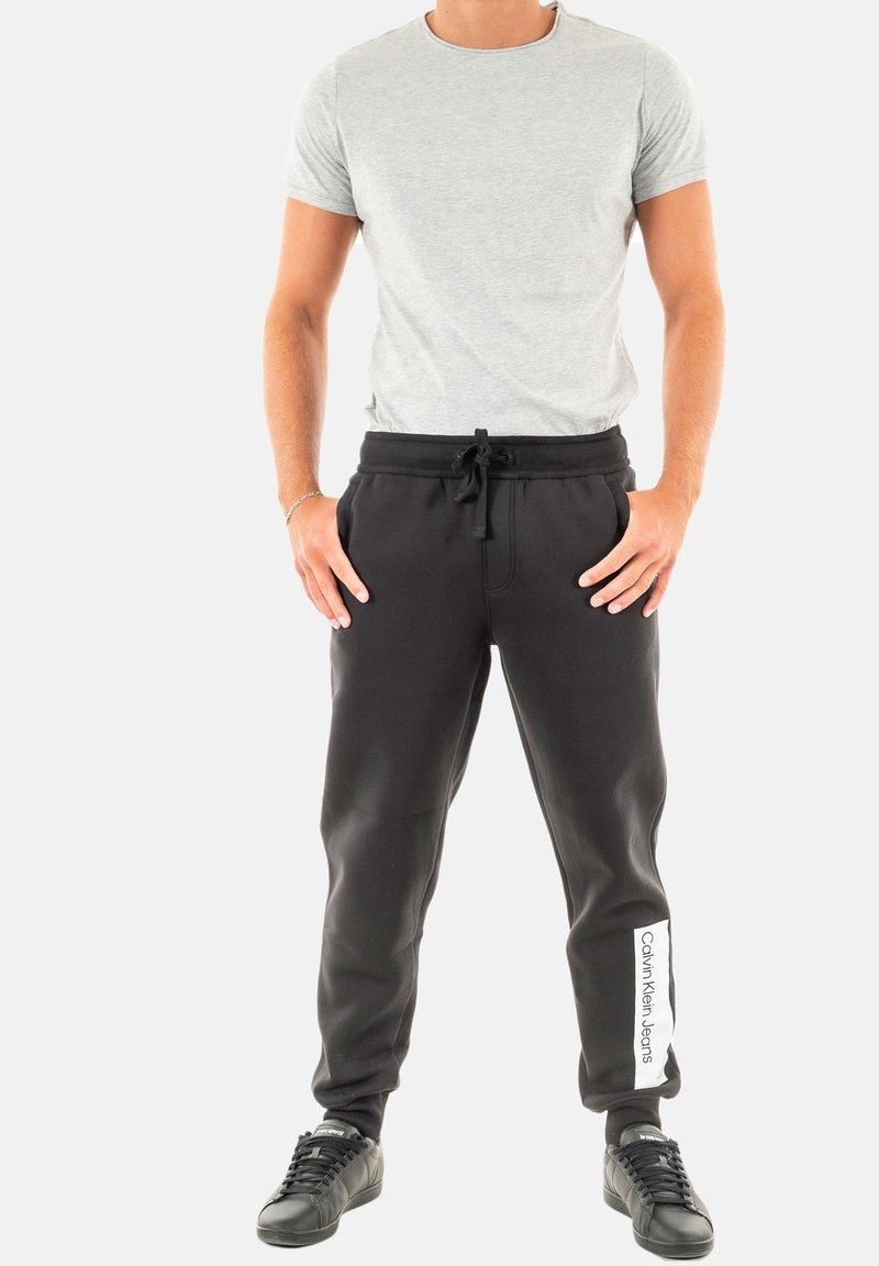 Calvin Klein Jeans Tracksuit Bottoms Noir Black Zalando De