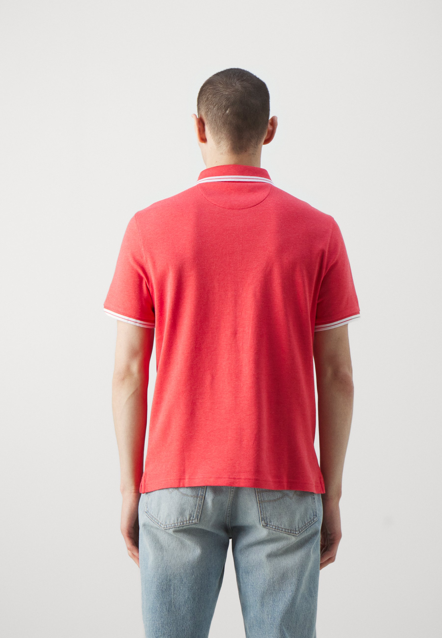 Michael Kors GREENWICH Polo shirt orange Zalando.ie