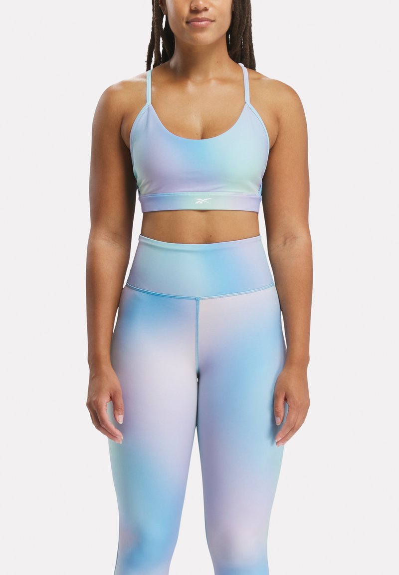 Reebok WORKOUT LUX PRINTED STRAPPY - Light support sports bra - bold ...