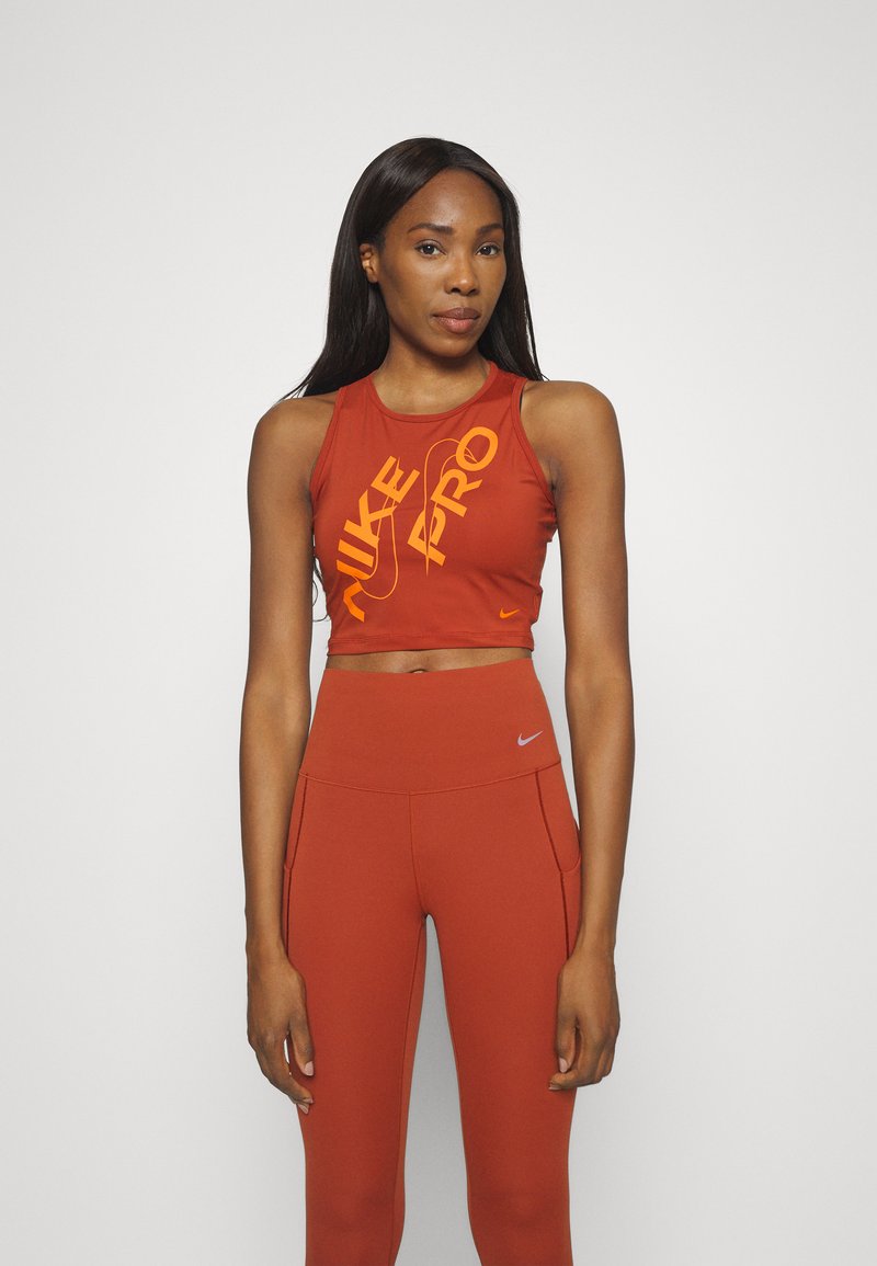 Nike Performance CROP TANK - Topper - rugged orange/safety orange ...