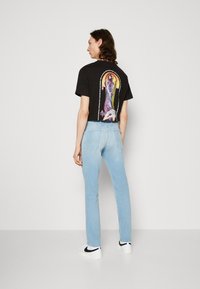 Replay ANBASS PANTS HYPERFLEX ORIGINAL - Jeans Slim Fit - light blue ...