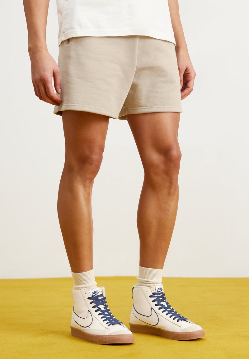 Alpha Industries ALPHA ESSENTIALS - Tracksuit bottoms - vintage sand ...