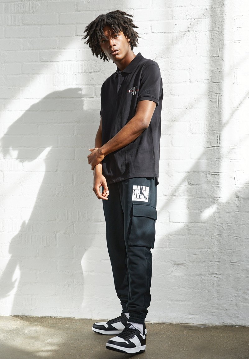 Calvin Klein Jeans Urban Graphic Pant Tracksuit Bottoms Black