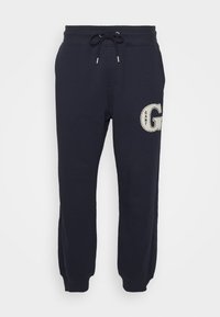 GANT Tracksuit bottoms - evening blue/dark blue - Zalando.ie
