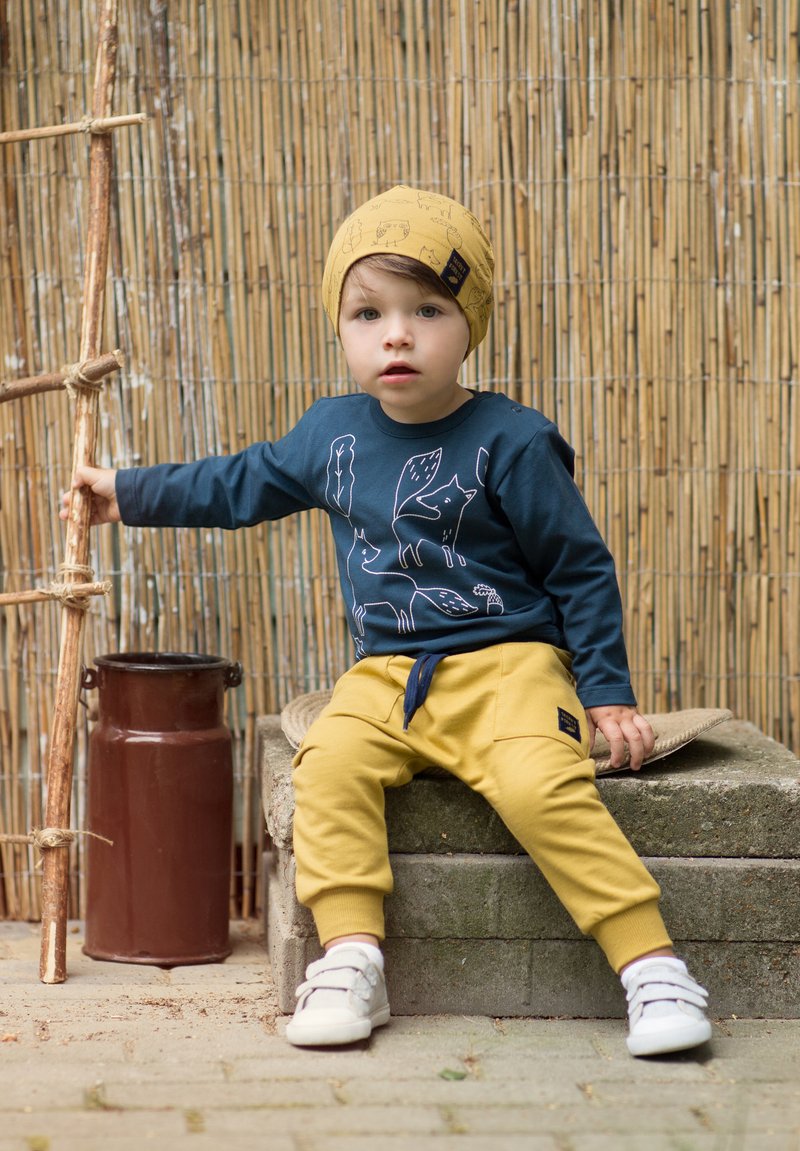 Pinokio JOGGERS SECRET FOREST LEGS - Trainingsbroek - curry/donkergeel ...