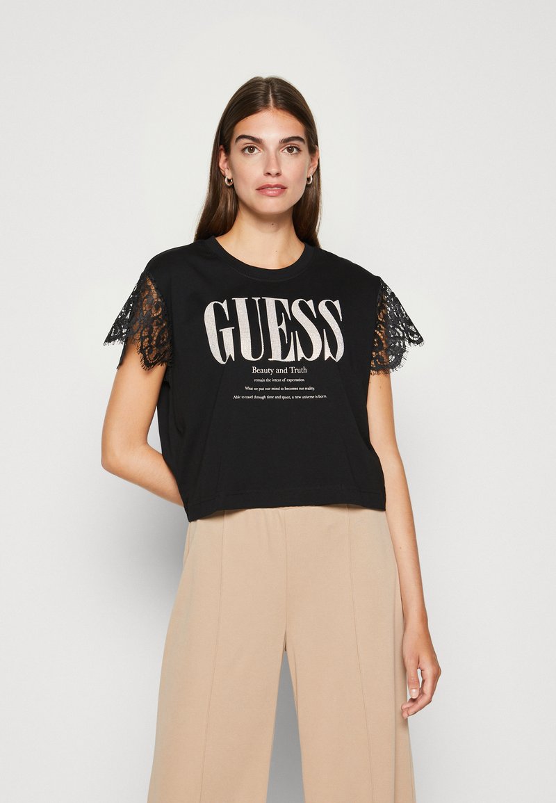 Guess BIG SHINY LOGO TEE - T-Shirt print - jet black/schwarz - Zalando.ch