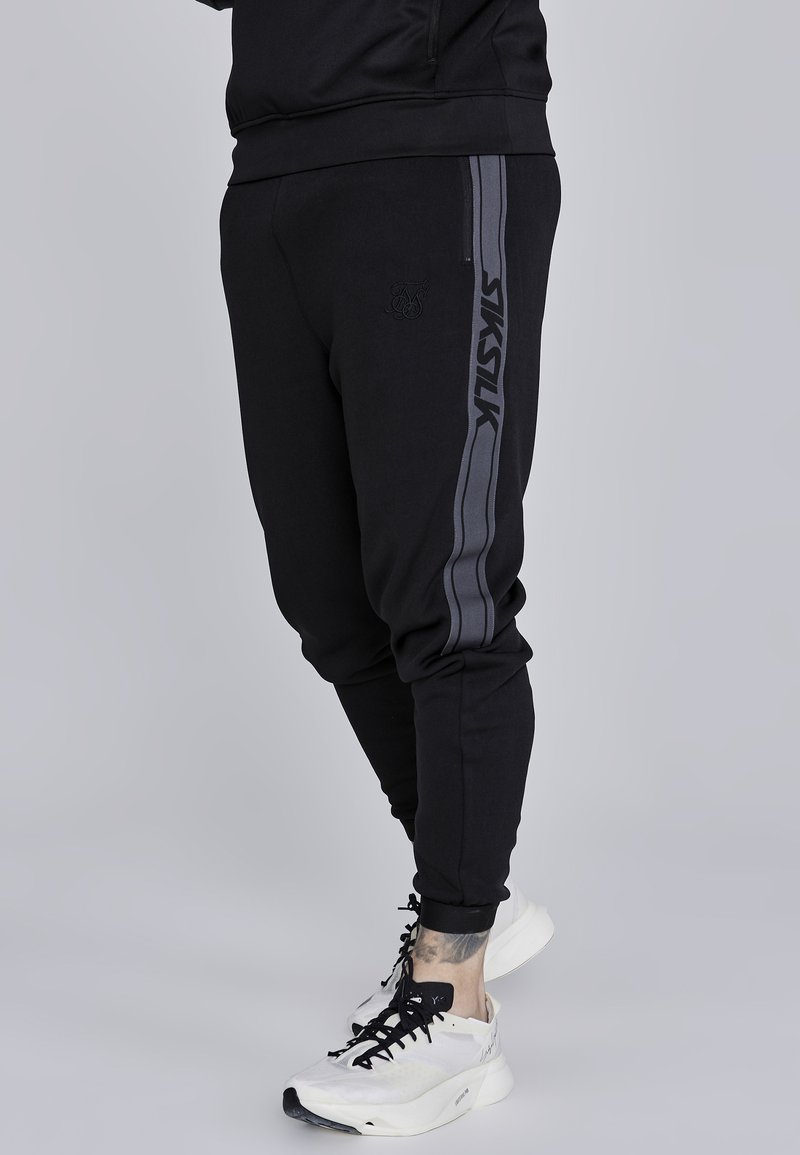 SIKSILK MUSCLE FIT - Träningsbyxor - black/svart - Zalando.se
