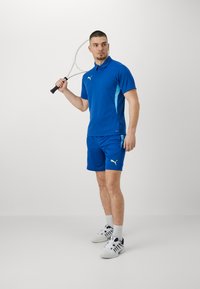 Puma INDIVIDUAL PADEL - Polo shirt - blue/dark blue - Zalando.co.uk