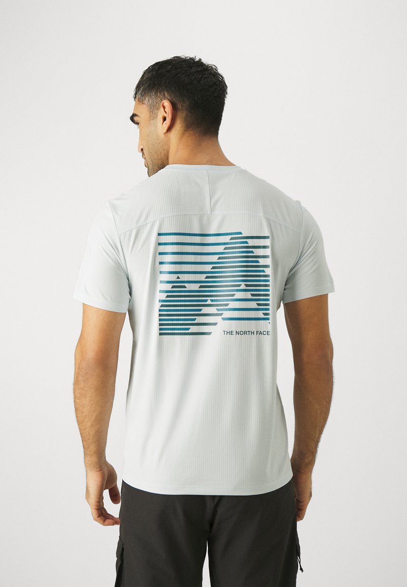The North Face PERFORMANCE GRAPHIC TEE - Print T-shirt - barely blue ...