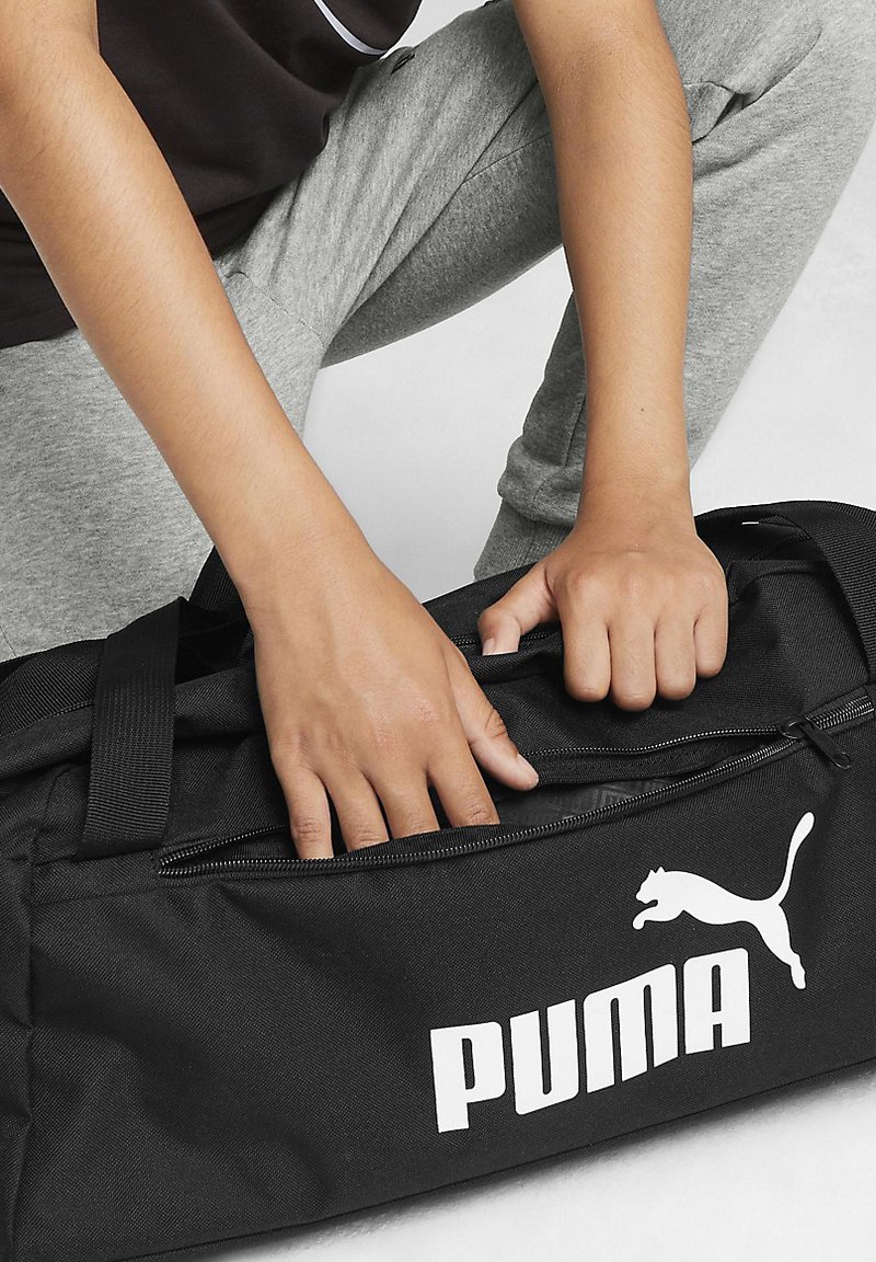 Puma PHASE UNISEX - Sports bag - puma black/black - Zalando.ie
