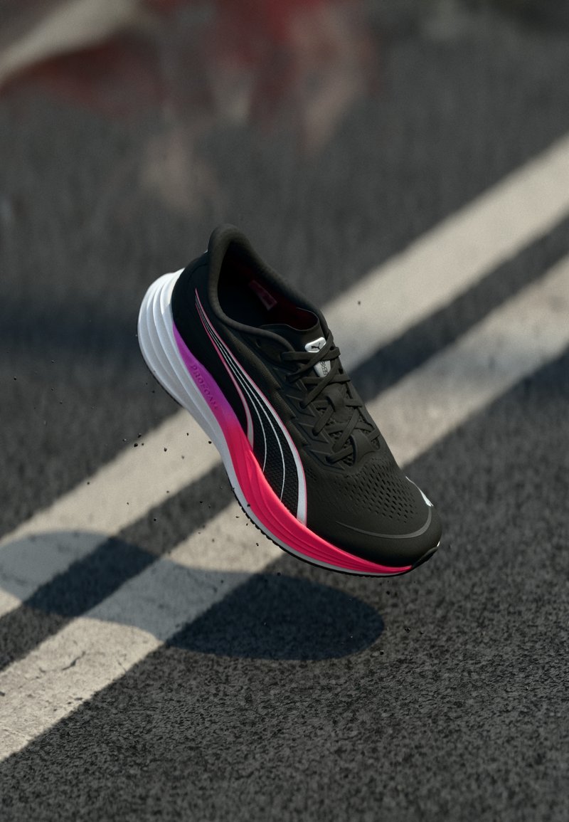 Puma DARTER PRO 2 UNISEX - Road running shoes - black/pure pink ...