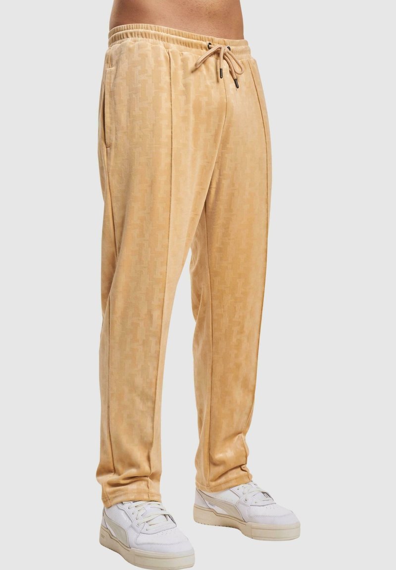 Karl Kani KK SMALL SIGNATURE MONOGRAM - Pantalon de survêtement - sand ...