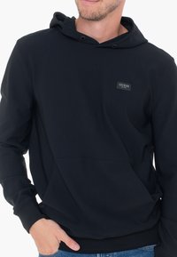 Guess TECH - Sweat à capuche - jet black a/noir - ZALANDO